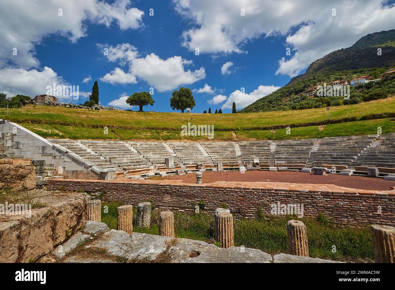 View of an amphitheatre with surrounding trees and mountains in the ...