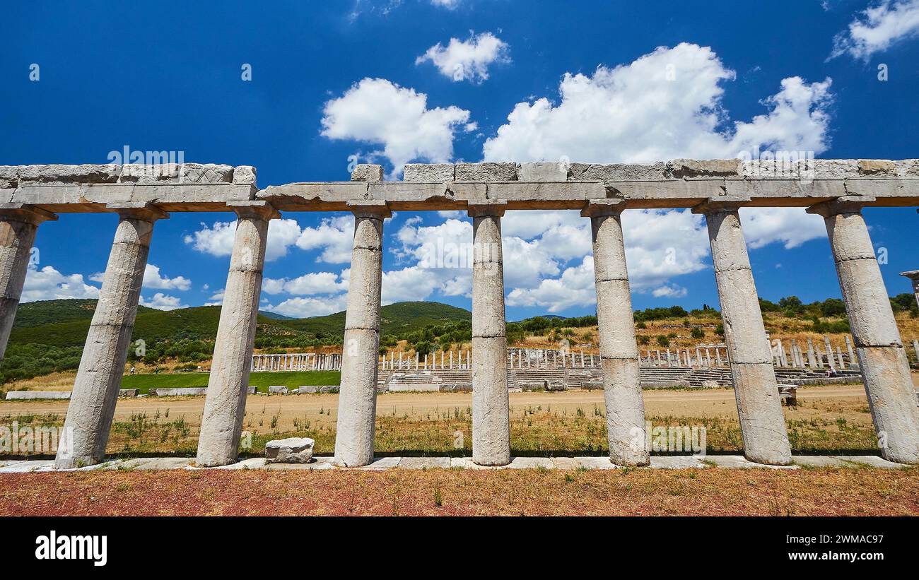 Partially reconstructed ancient row of columns in front of an ancient ...