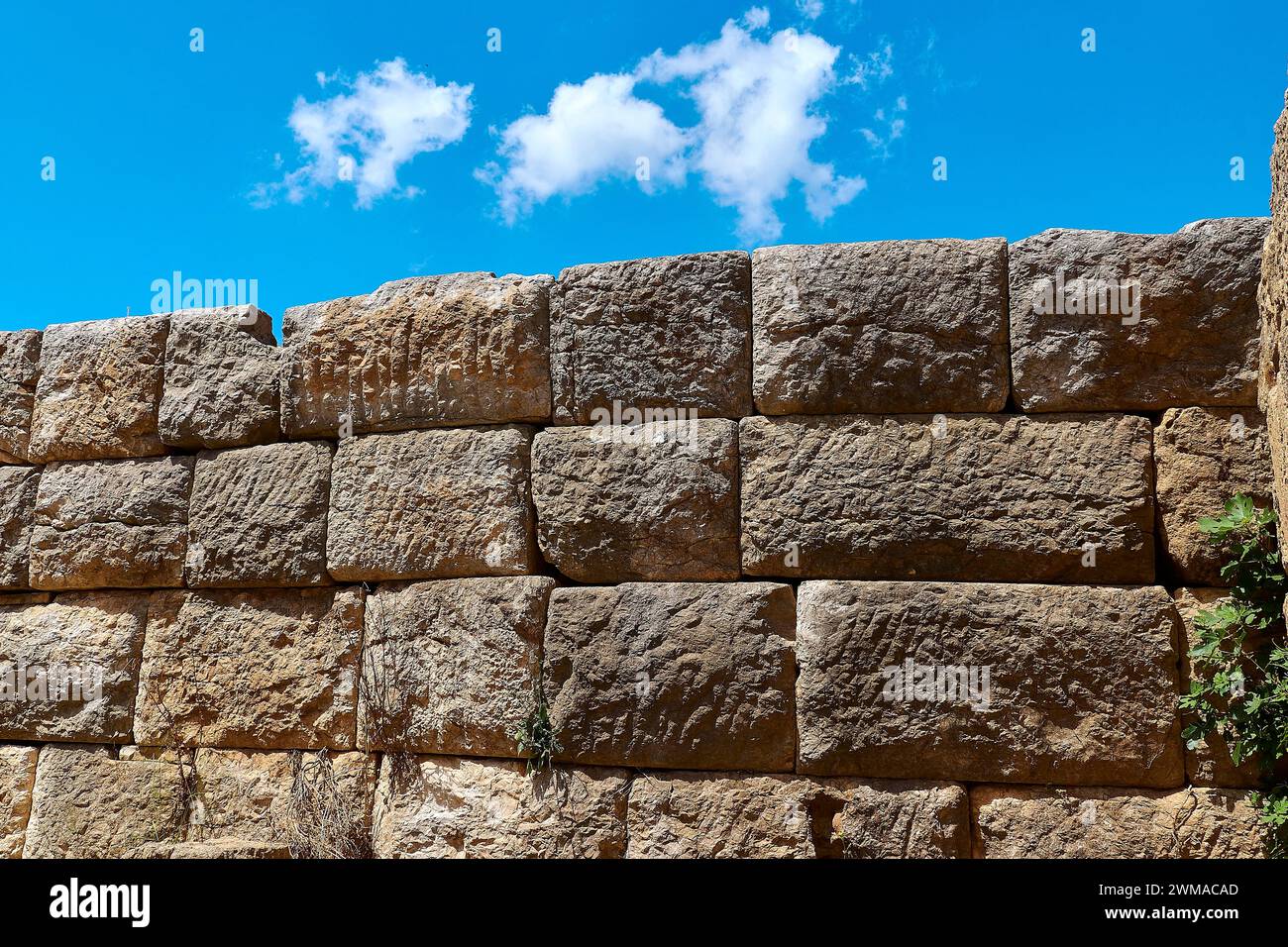 Detail of an old stone wall with visible stone structures ...