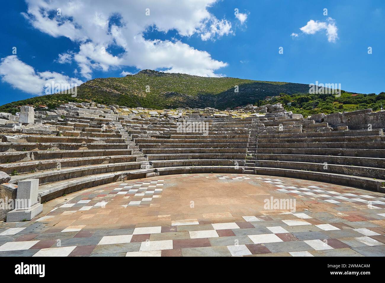 Sunny view of the ancient theatre with a view of the stage and the rows ...