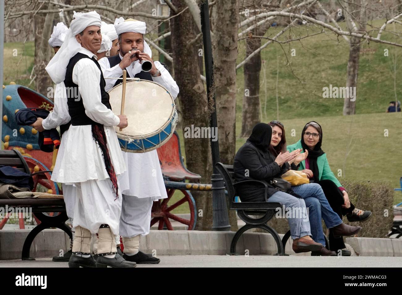 Musicians in traditional dress play music in a park in Tehran, Iran ...