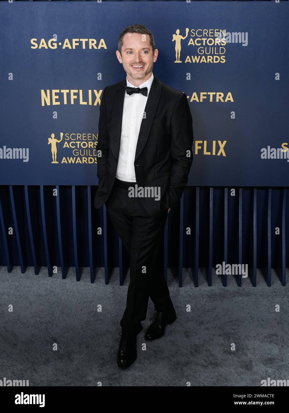 Los Angeles, USA. 24th Feb, 2024. Elijah Wood walking on the red carpet ...
