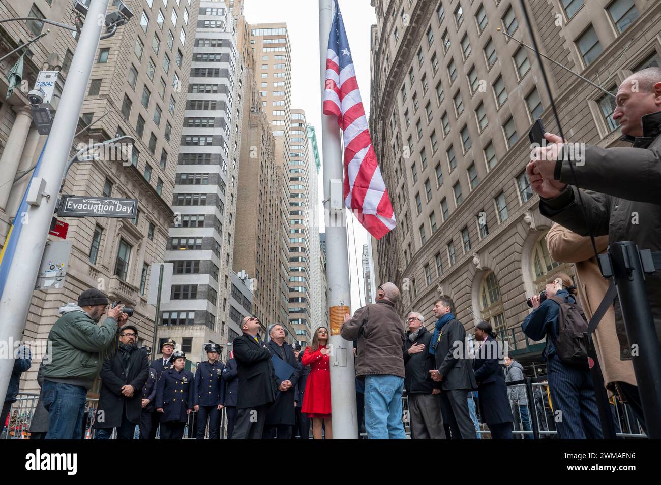 The Stars and Stripes is raised to fly at a Flag-Raising Ceremony for ...