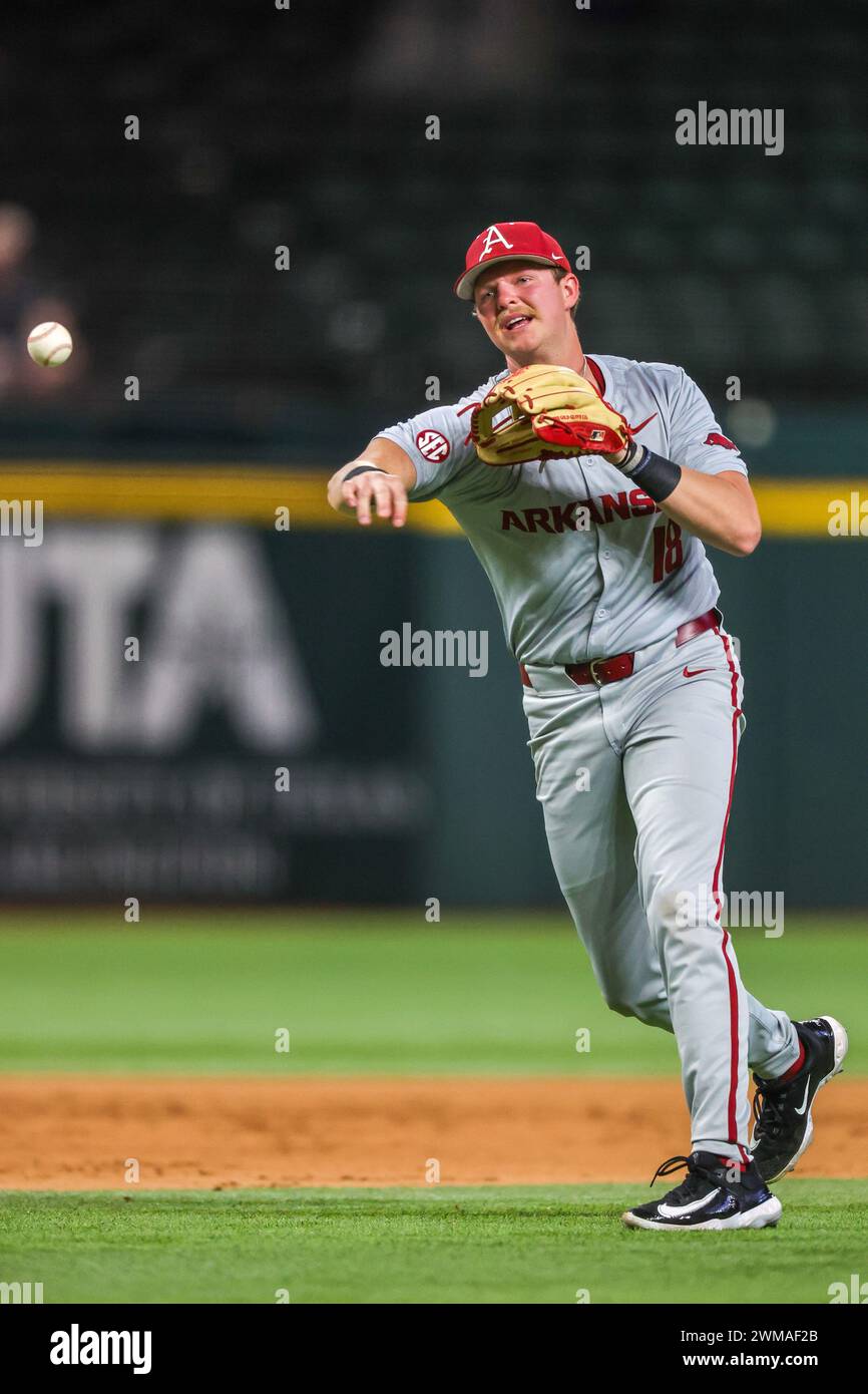 February 24, 2024: Arkansas infielder Reese Robinett #18 makes a throw ...