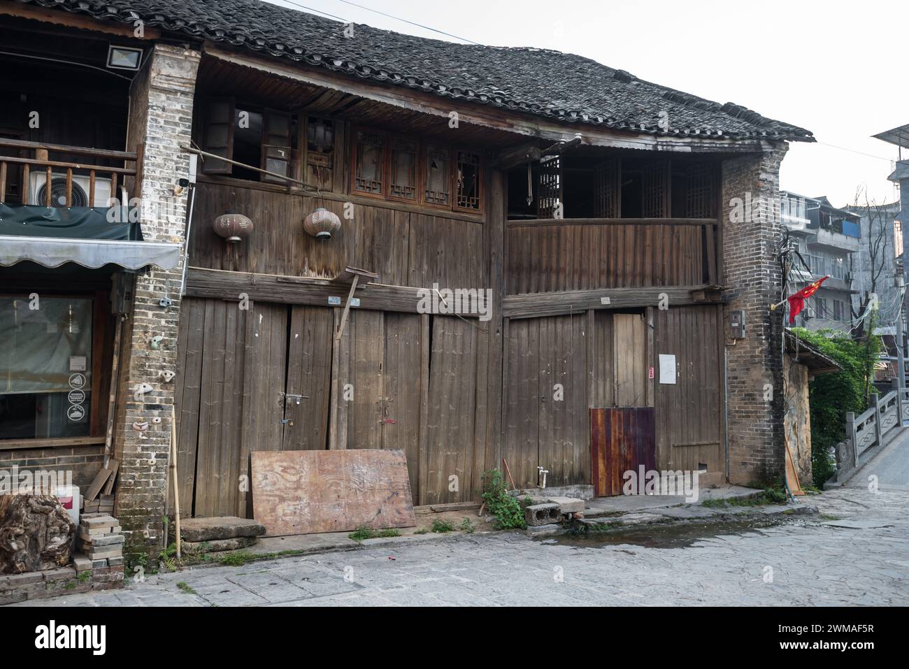 The exterior of an old Chinese wooden house Stock Photo - Alamy