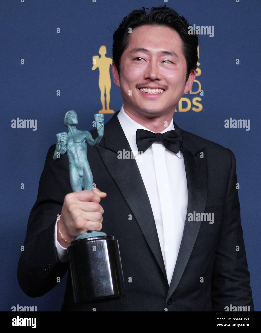 Steven Yeun, winner of the Outstanding Male Actor in a Television Movie ...