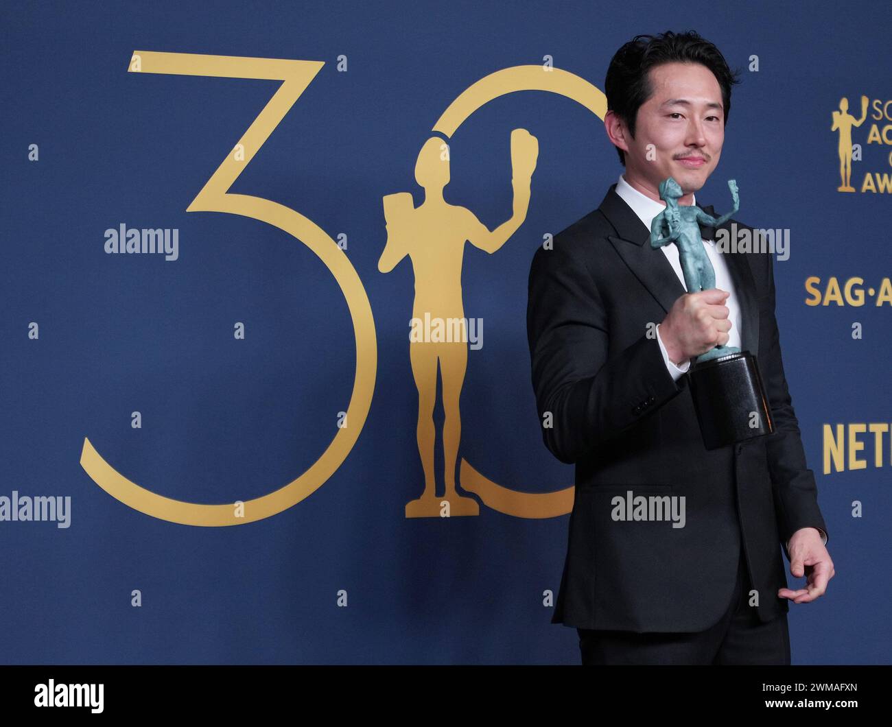 Steven Yeun, winner of the Outstanding Male Actor in a Television Movie ...