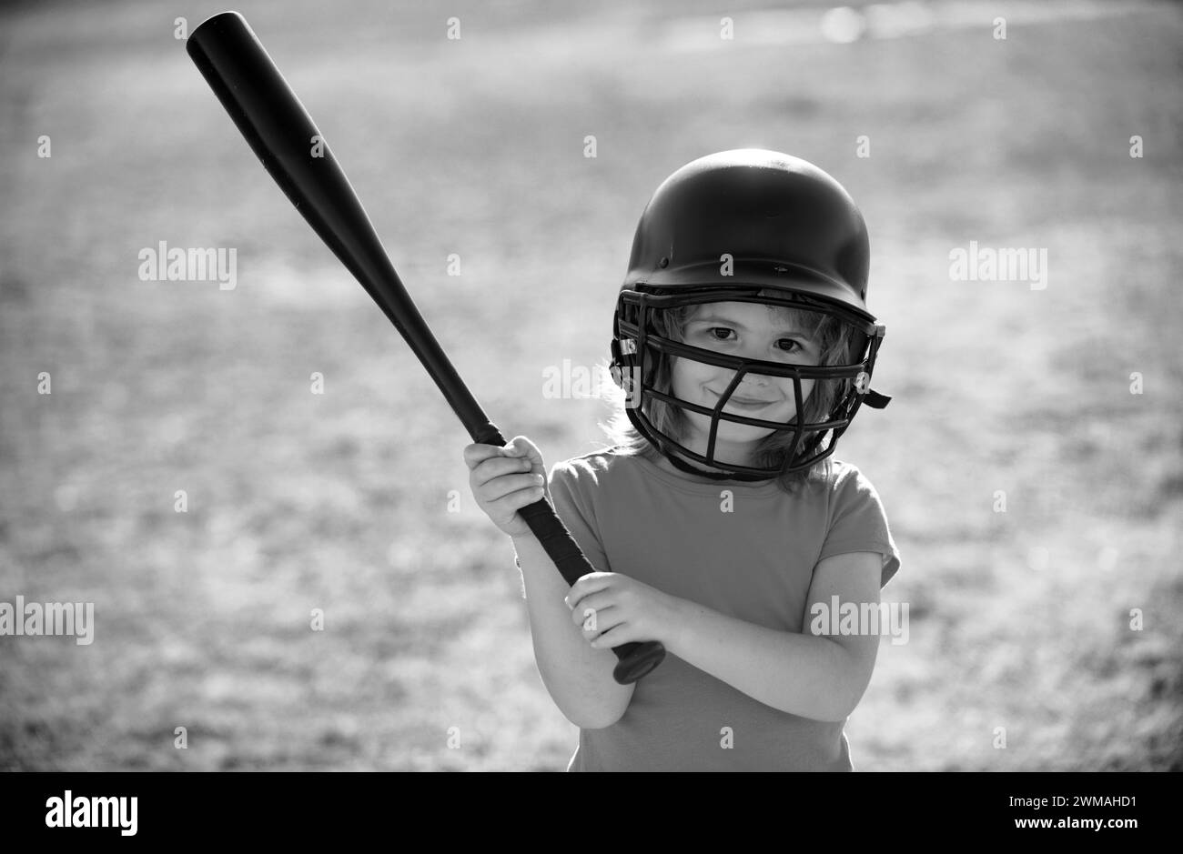 Little boy posing with a baseball bat. Portrait of kid playing baseball ...