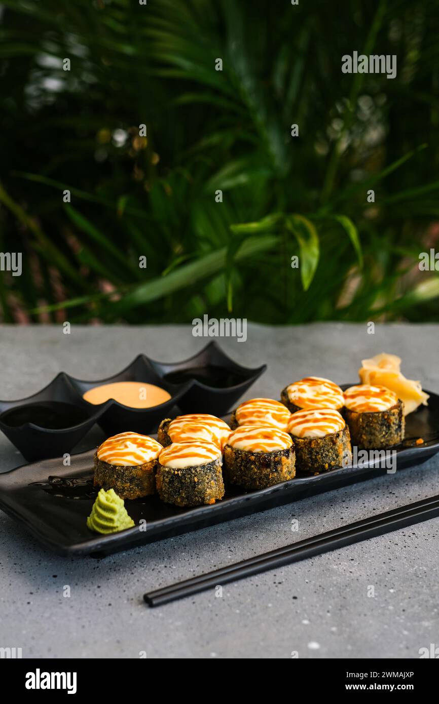 Rainbow Sushi Roll with salmon, eel, tuna, avocado, royal prawn, cream ...