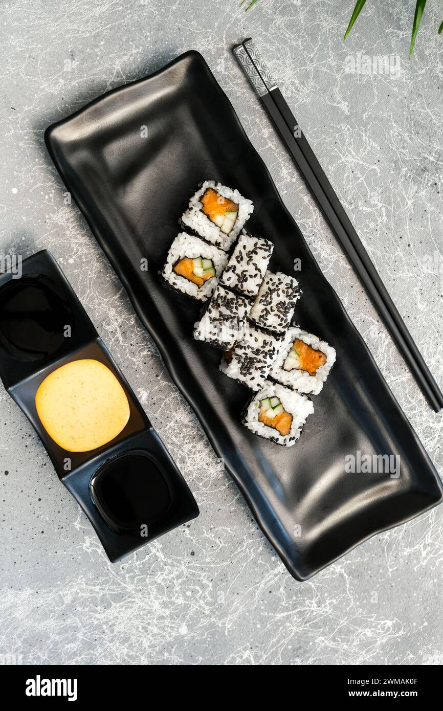 Rainbow Sushi Roll with salmon, eel, tuna, avocado, royal prawn, cream ...