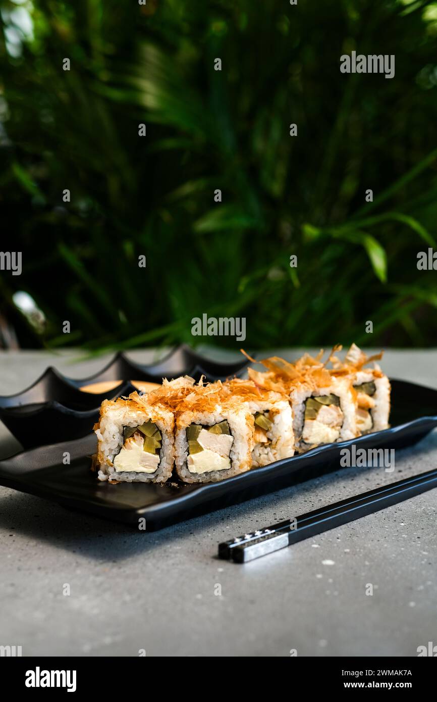 Rainbow Sushi Roll with salmon, eel, tuna, avocado, royal prawn, cream ...