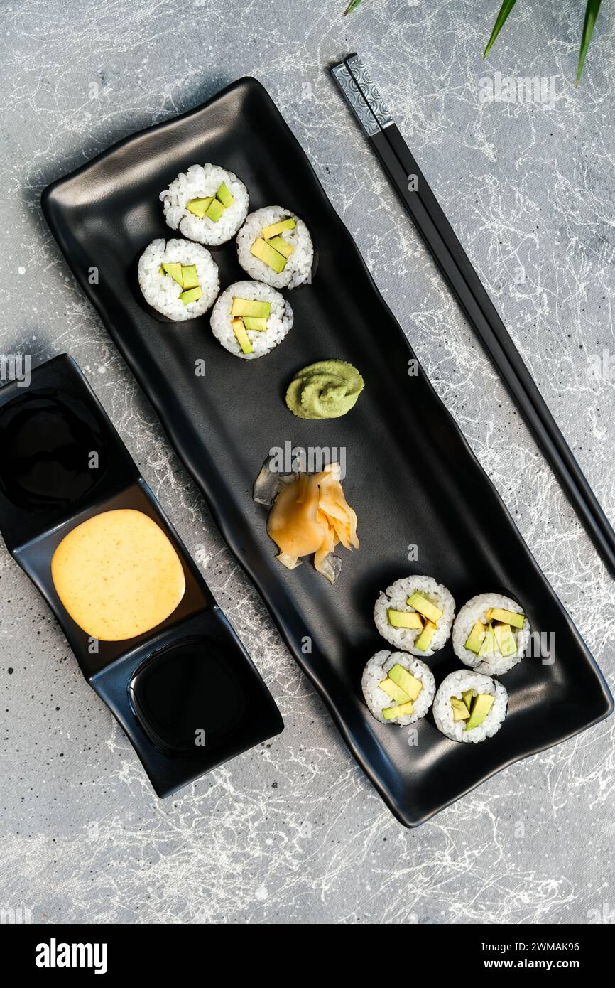 Rainbow Sushi Roll with salmon, eel, tuna, avocado, royal prawn, cream ...
