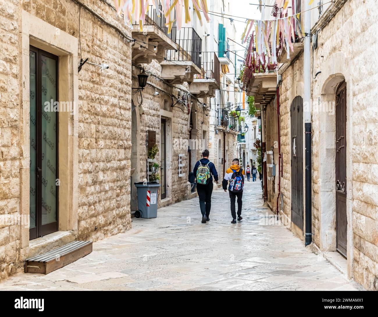 narrow street of the medieval town of Bitetto, Bari province, Puglia ...