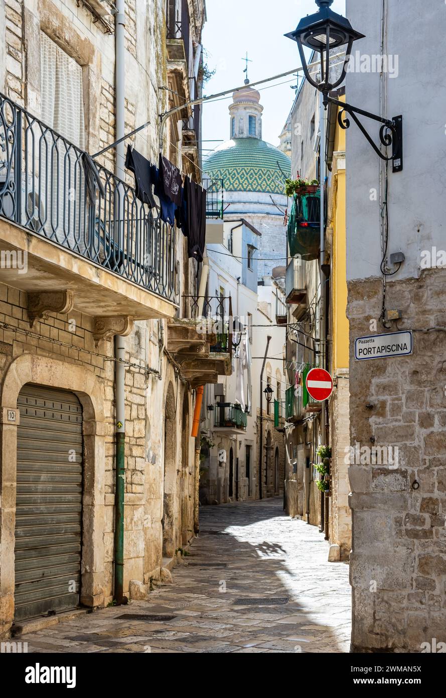 narrow street of the medieval town of Bitetto, Bari province, Puglia ...