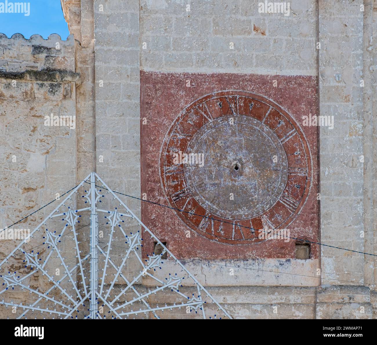 ancient sundial on the wall of the Cathedral of Saint Michael Archangel ...
