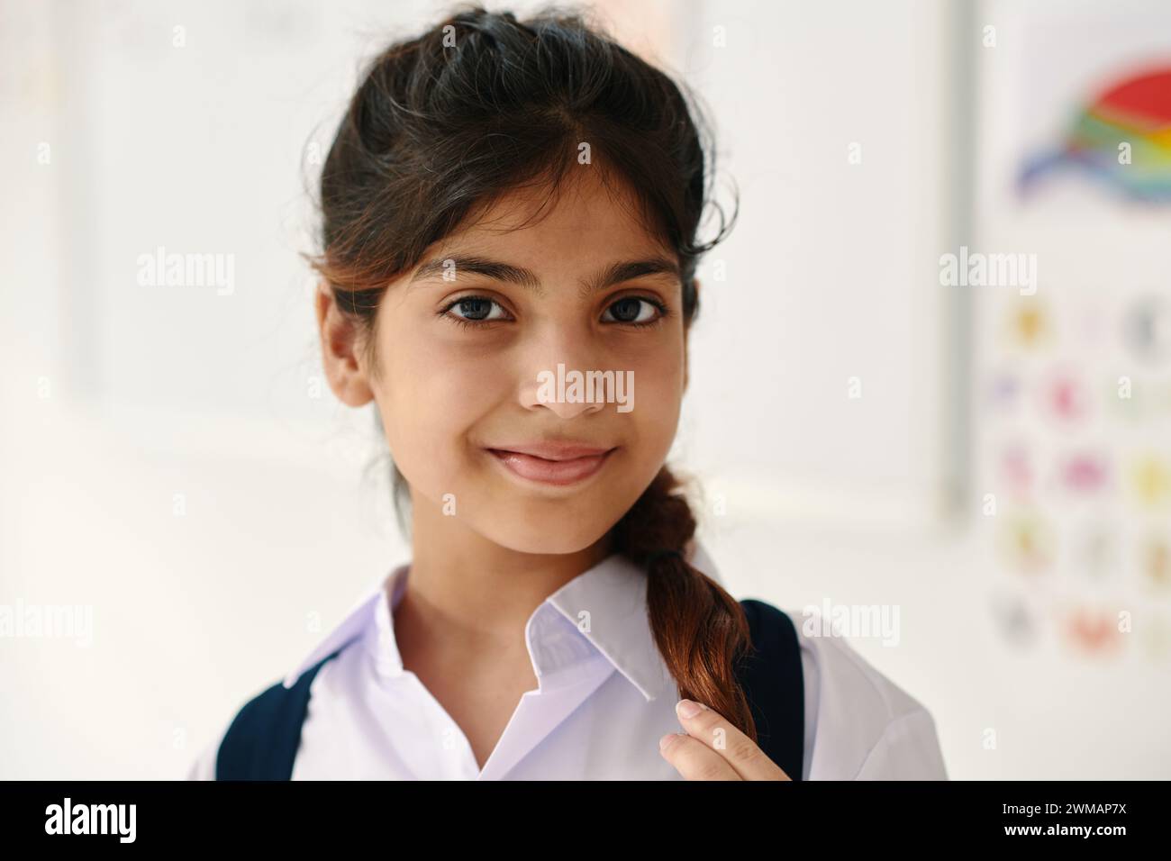 Portrait of smiling Indian school girl in class Stock Photo - Alamy