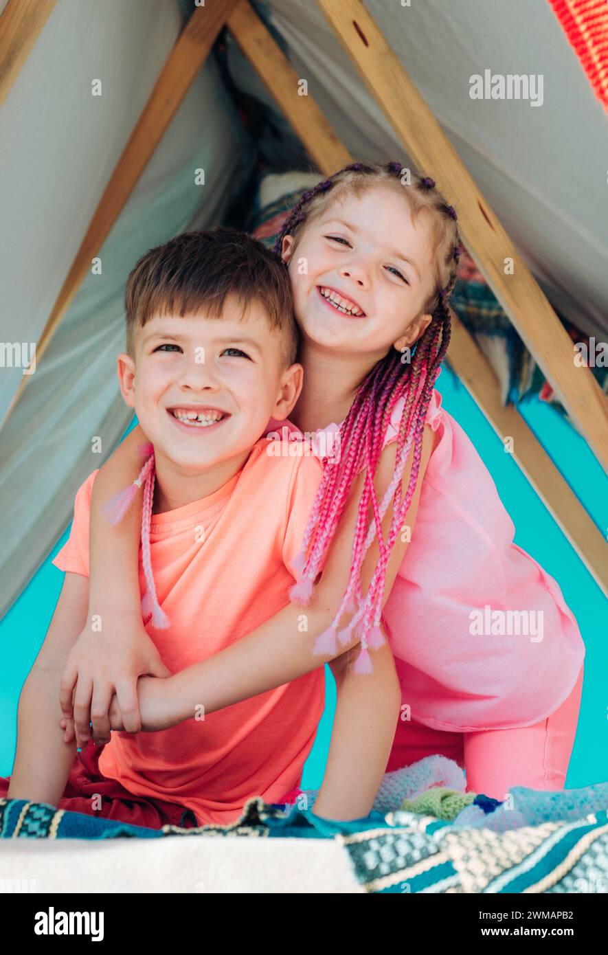 Kids family. Happy sister and brother embrace. Hugs and love Stock Photo - Alamy