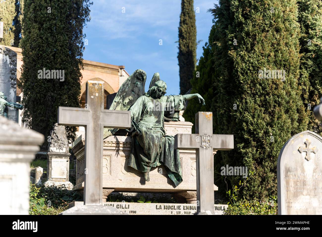 Statue of an angel on a grave in the Cimitero Evangelico agli Allori ...