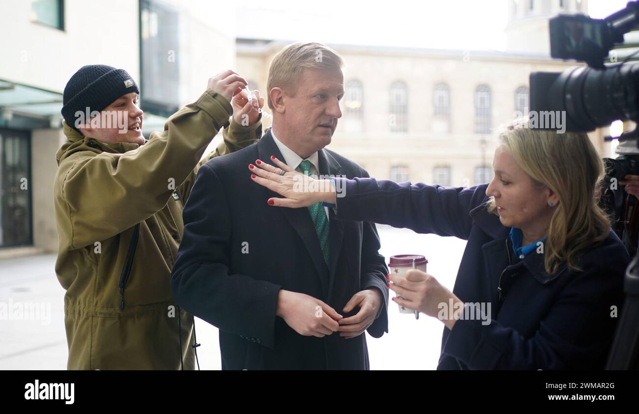 Deputy Prime Minister Oliver Dowden prepares to speak to the media as ...