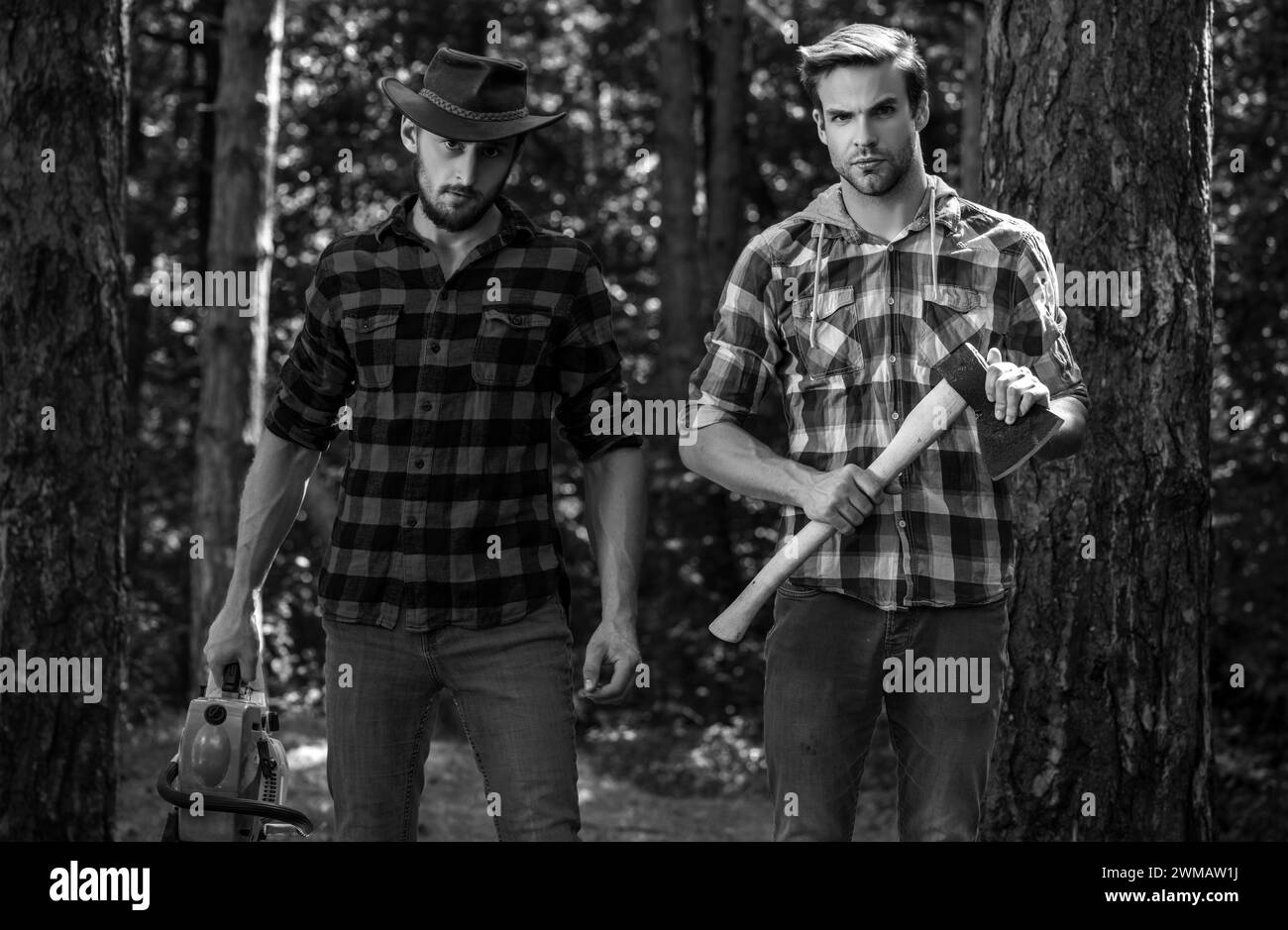 Two friends Lumberjack worker in the forest. Woodcutter with axe and ...