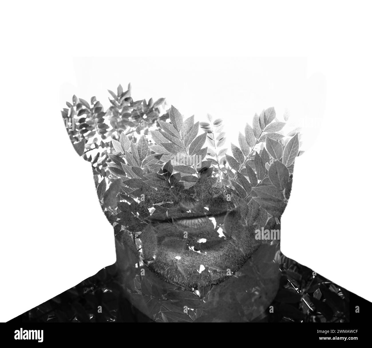 A black and white double exposure male portrait disappearing to the ...