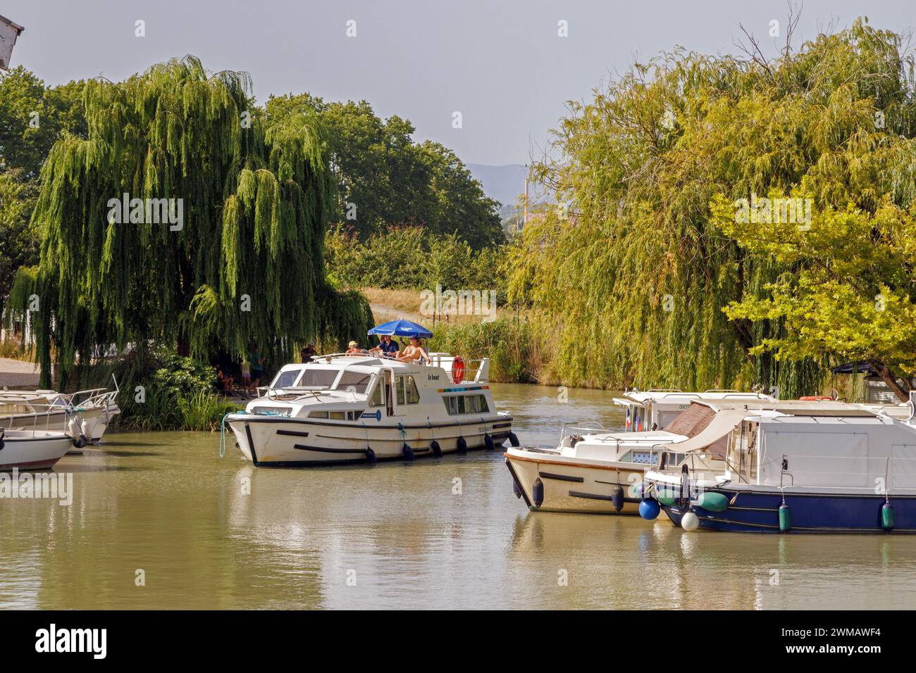 Navigation on the Canal du Midi. Entering the port of Colombiers ...