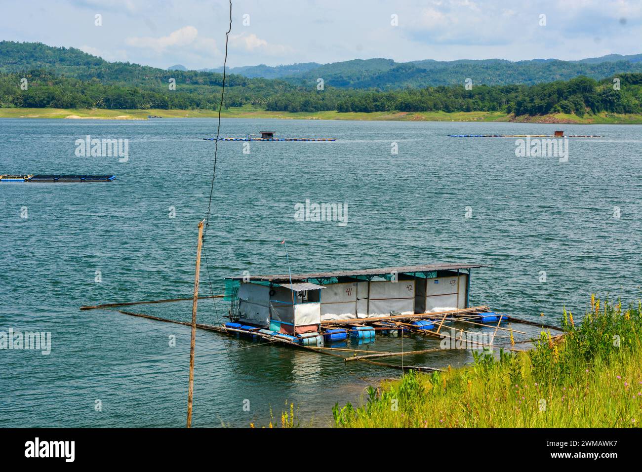 Photo of a reservoir with a freshwater fish farming pond Stock Photo ...