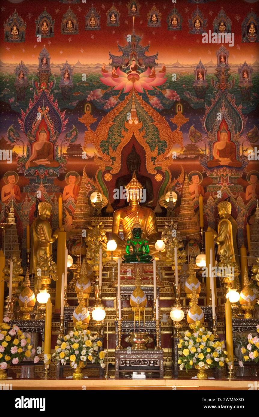 Buddhist temple interior UK. Golden Buddhas. Buddhapadipa Temple in ...
