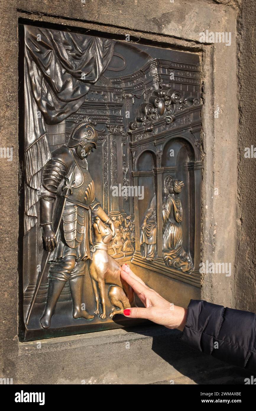 Prague, Czech Republic - January, 2024: Touching the relief at John of ...