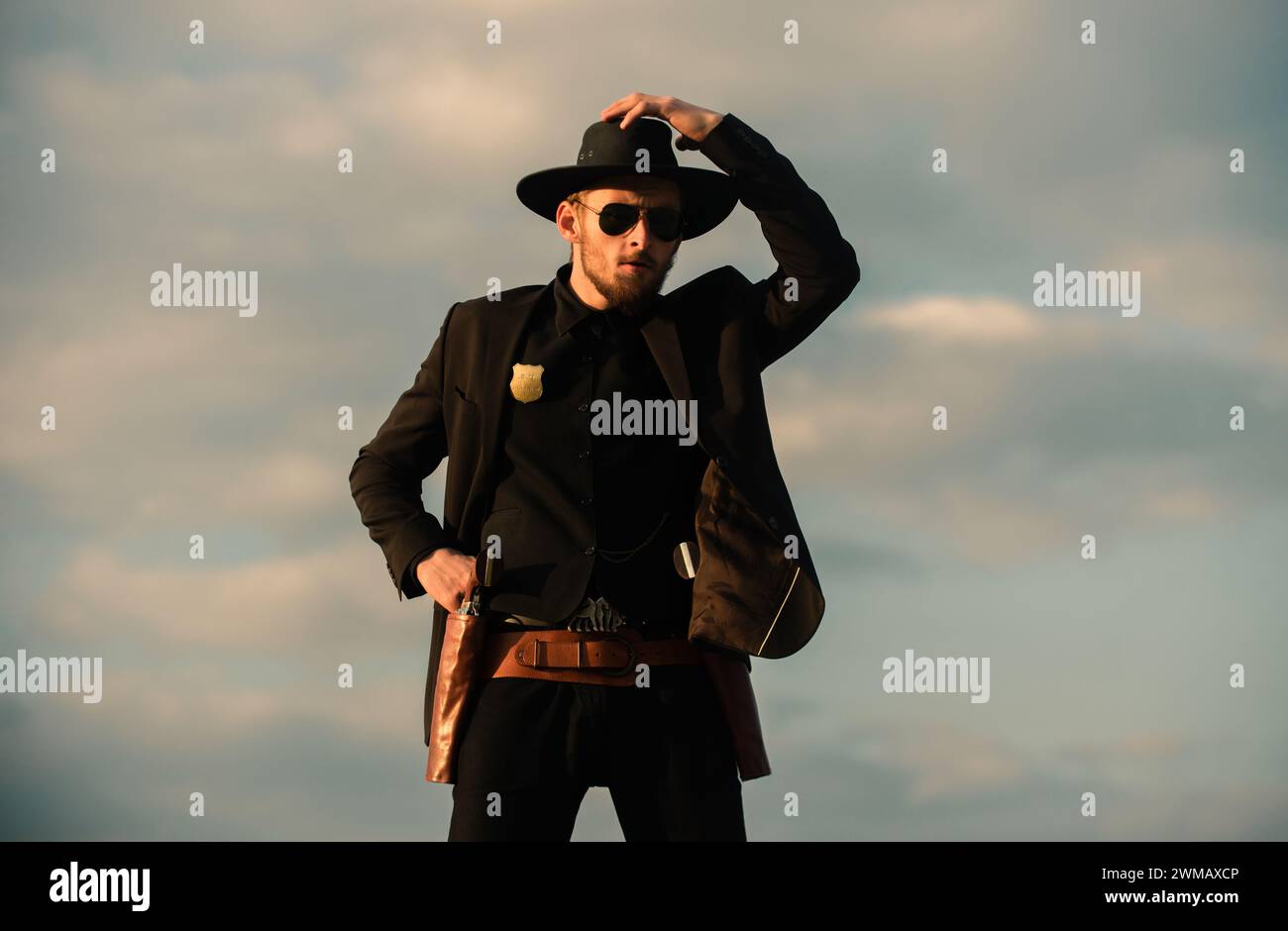 Cowboy shooter in cowboy hat. Serious man with wild west guns, retro ...
