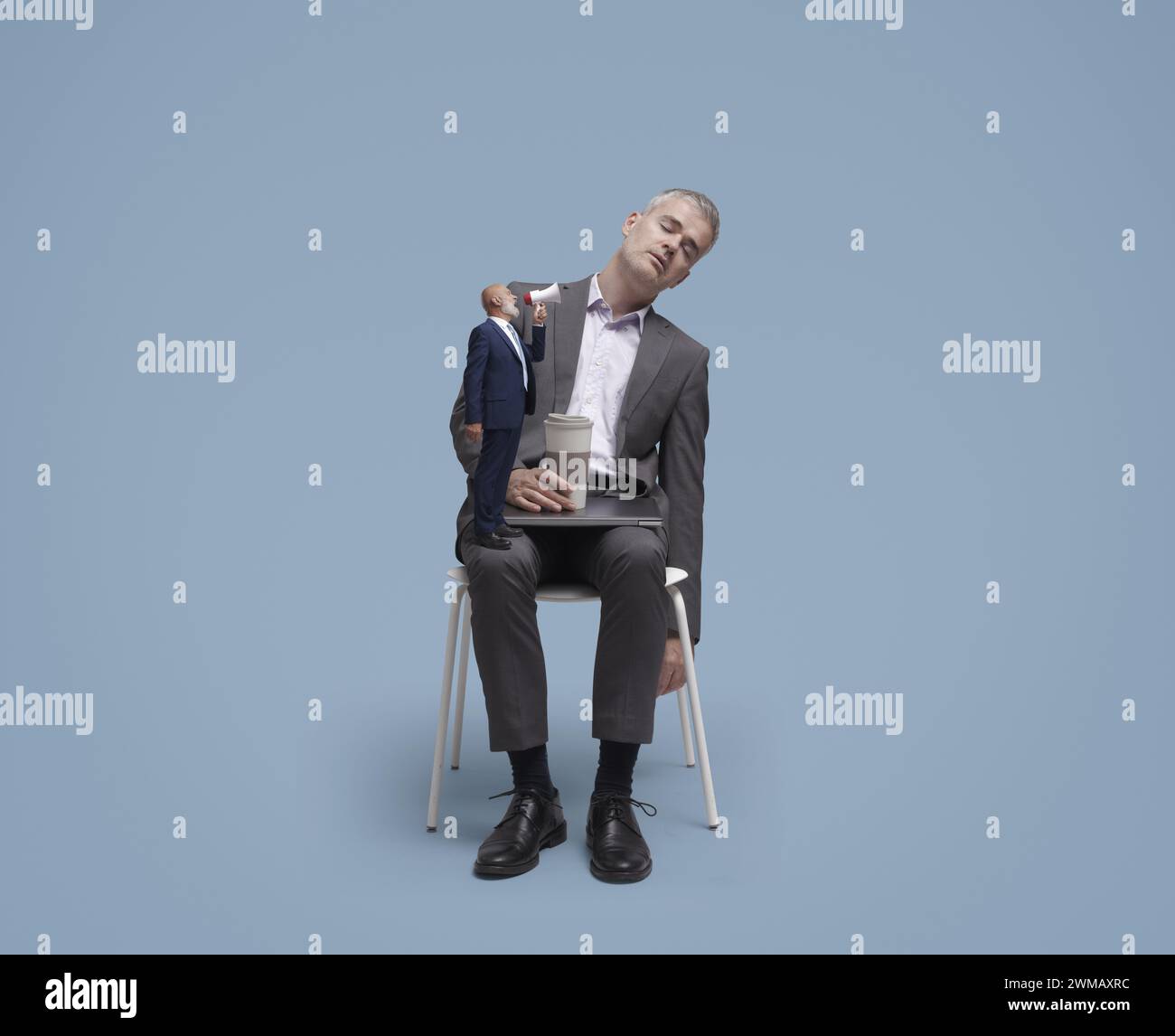 Tiny boss shouting at his sleepy lazy employee using a megaphone Stock ...