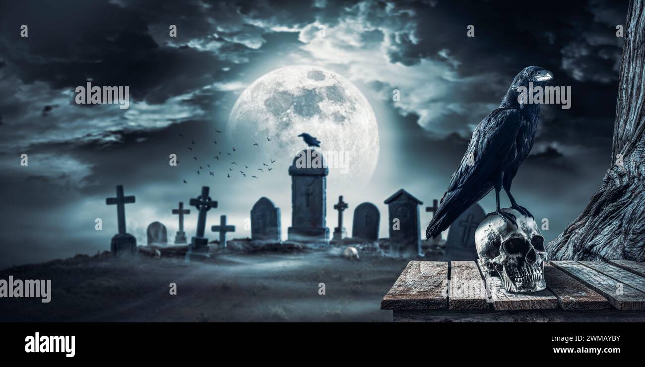 Creepy old cemetery at night with spooky crow standing on a human skull ...