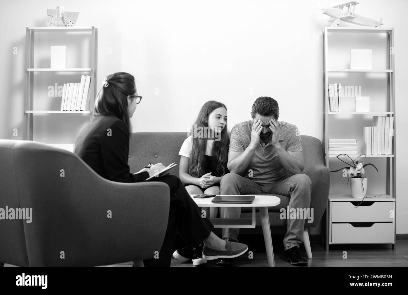 Social worker counseling parental. Psychologist with father and ...