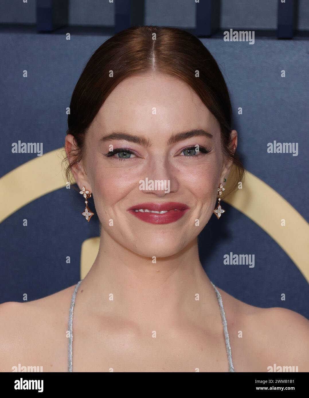 LOS ANGELES, CALIFORNIA, USA - FEBRUARY 24: Emma Stone wearing a Louis ...