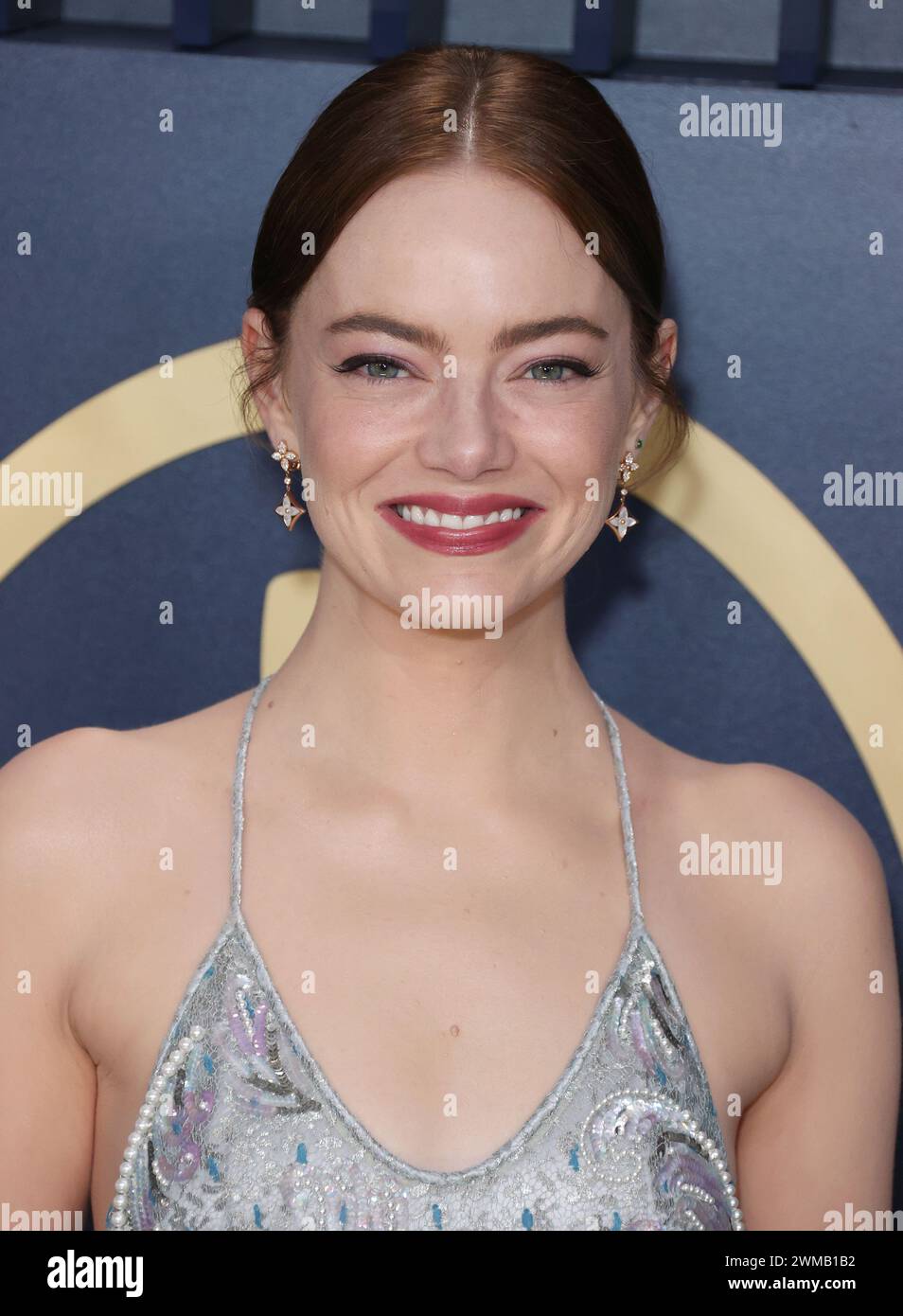 LOS ANGELES, CALIFORNIA, USA - FEBRUARY 24: Emma Stone wearing a Louis ...