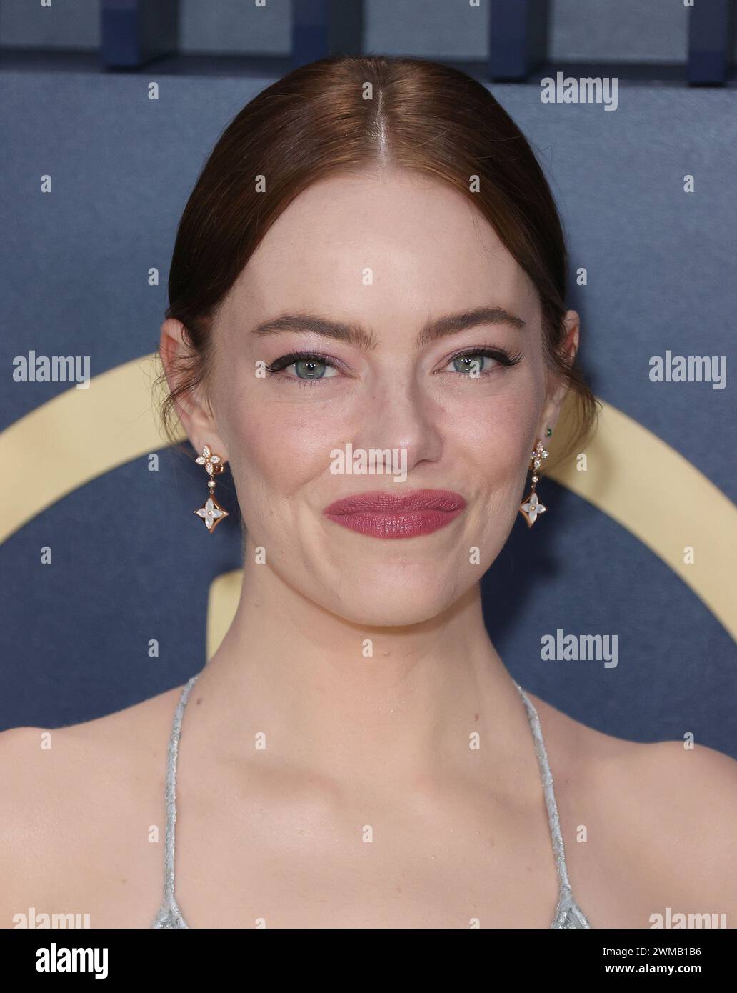 LOS ANGELES, CALIFORNIA, USA - FEBRUARY 24: Emma Stone wearing a Louis ...