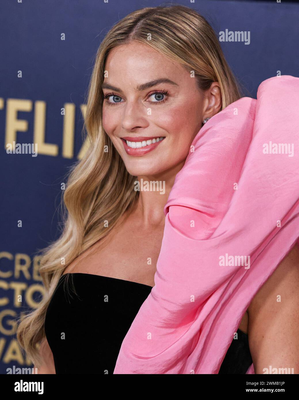 LOS ANGELES, CALIFORNIA, USA - FEBRUARY 24: Margot Robbie wearing ...