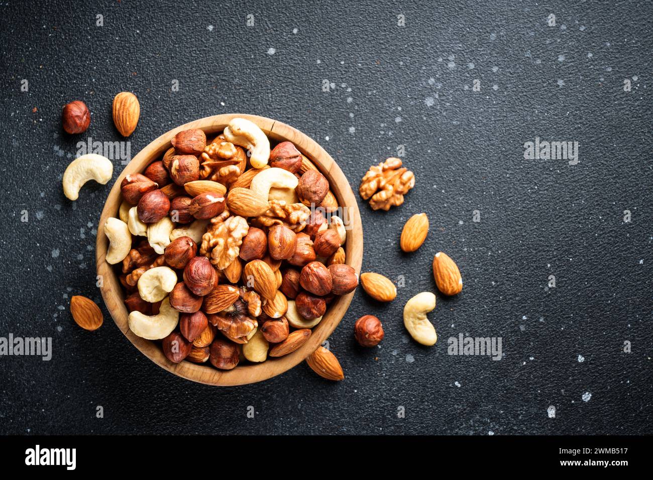 Nuts assortment at black background Stock Photo - Alamy