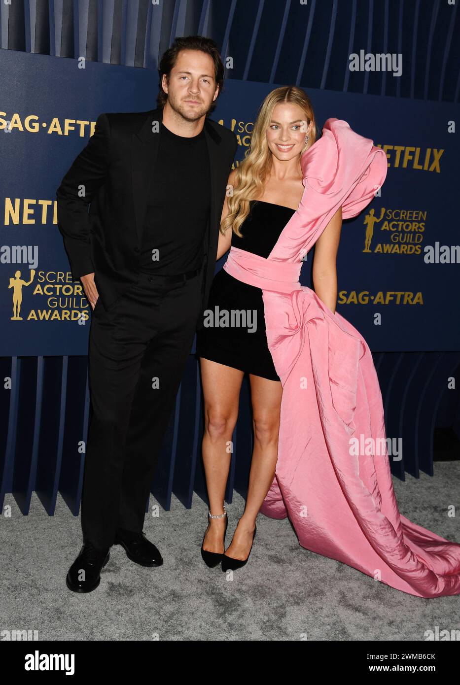 LOS ANGELES, CALIFORNIA - FEBRUARY 24: (L-R) Tom Ackerley and Margot ...