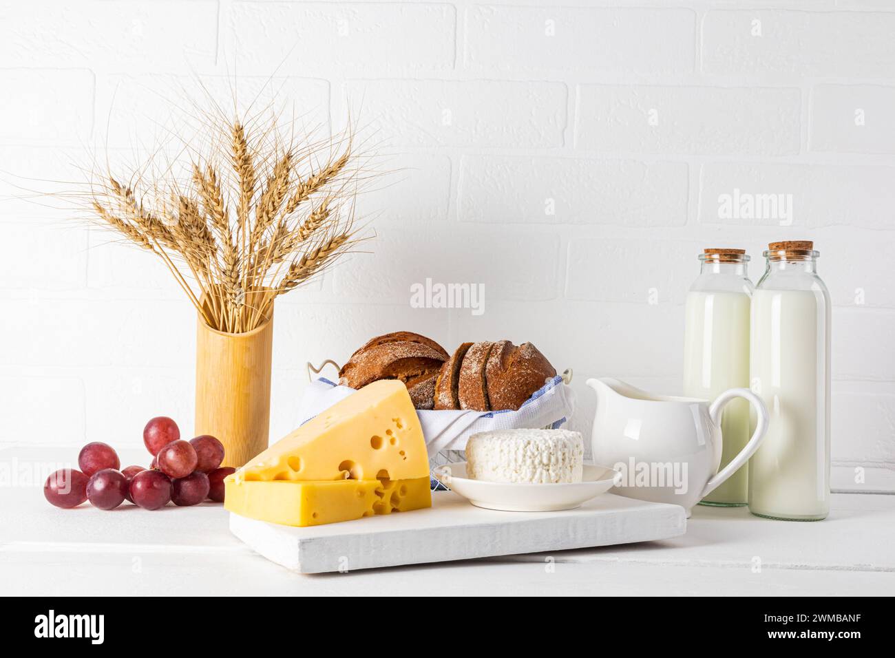festive still life for the Jewish holiday of Shavuot. Several types of ...