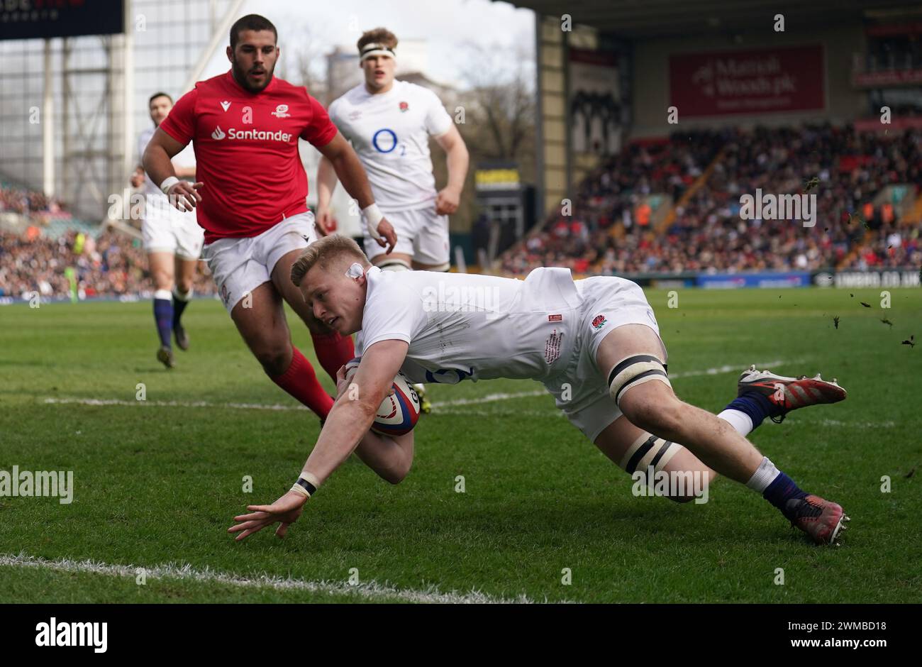 England's Tom Pearson dives in to scores his sides second try during ...