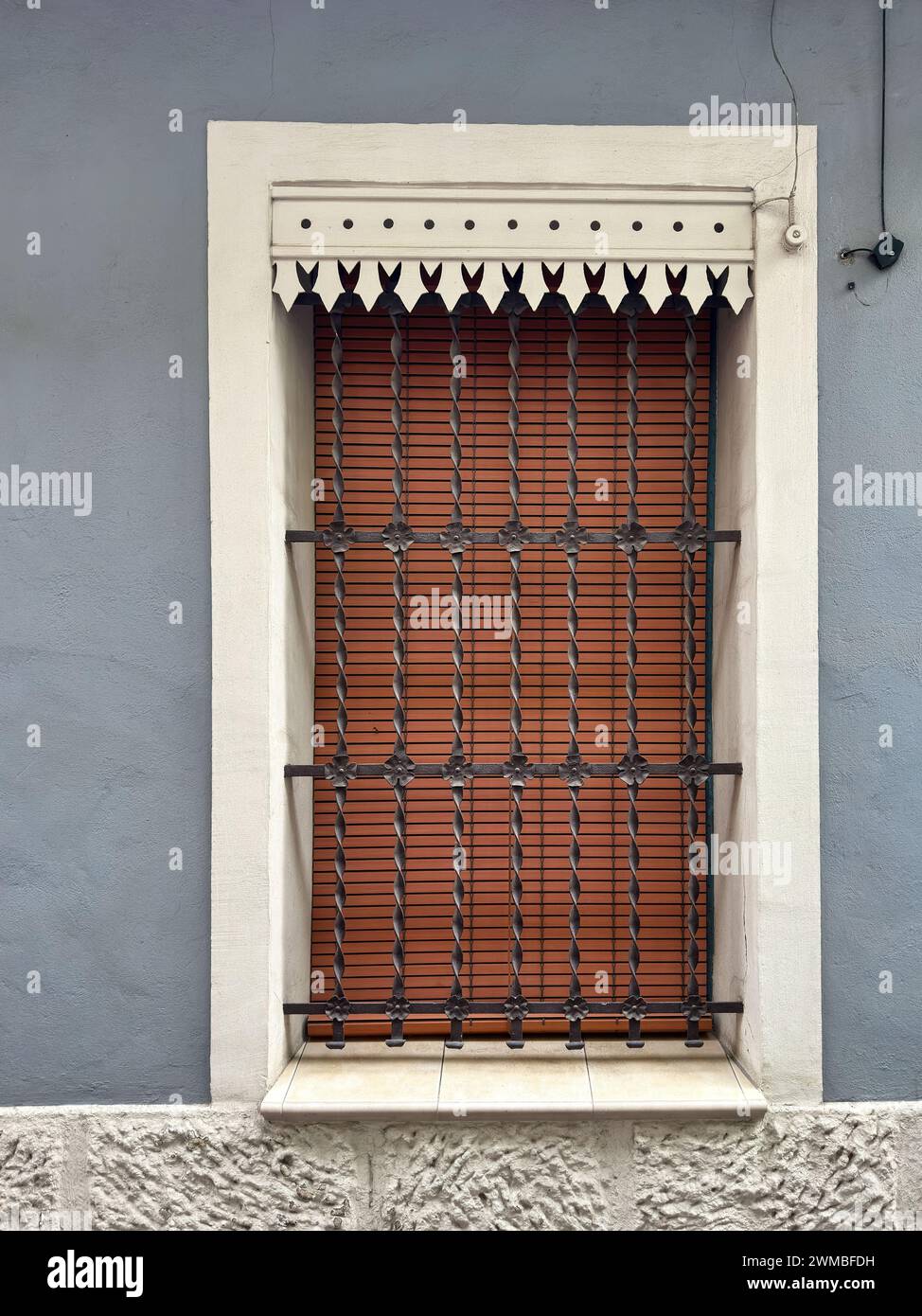 Window with metal grate, Alicante, Spain Stock Photo - Alamy