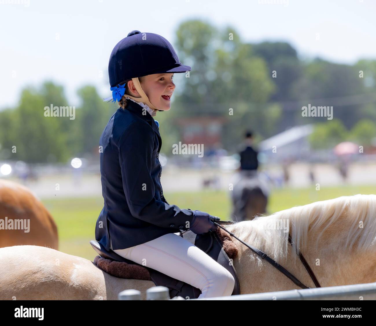 Canberra, Australia. 25th Feb, 2024. A girl rides a horse at the 2024 ...