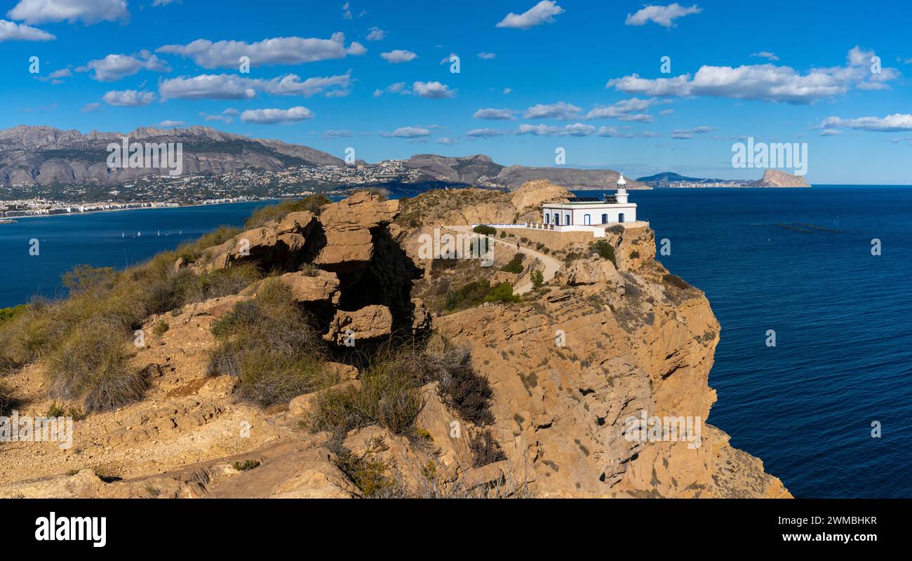 A view of the Albir Lighthouse on the rocky promontory in the Serra ...