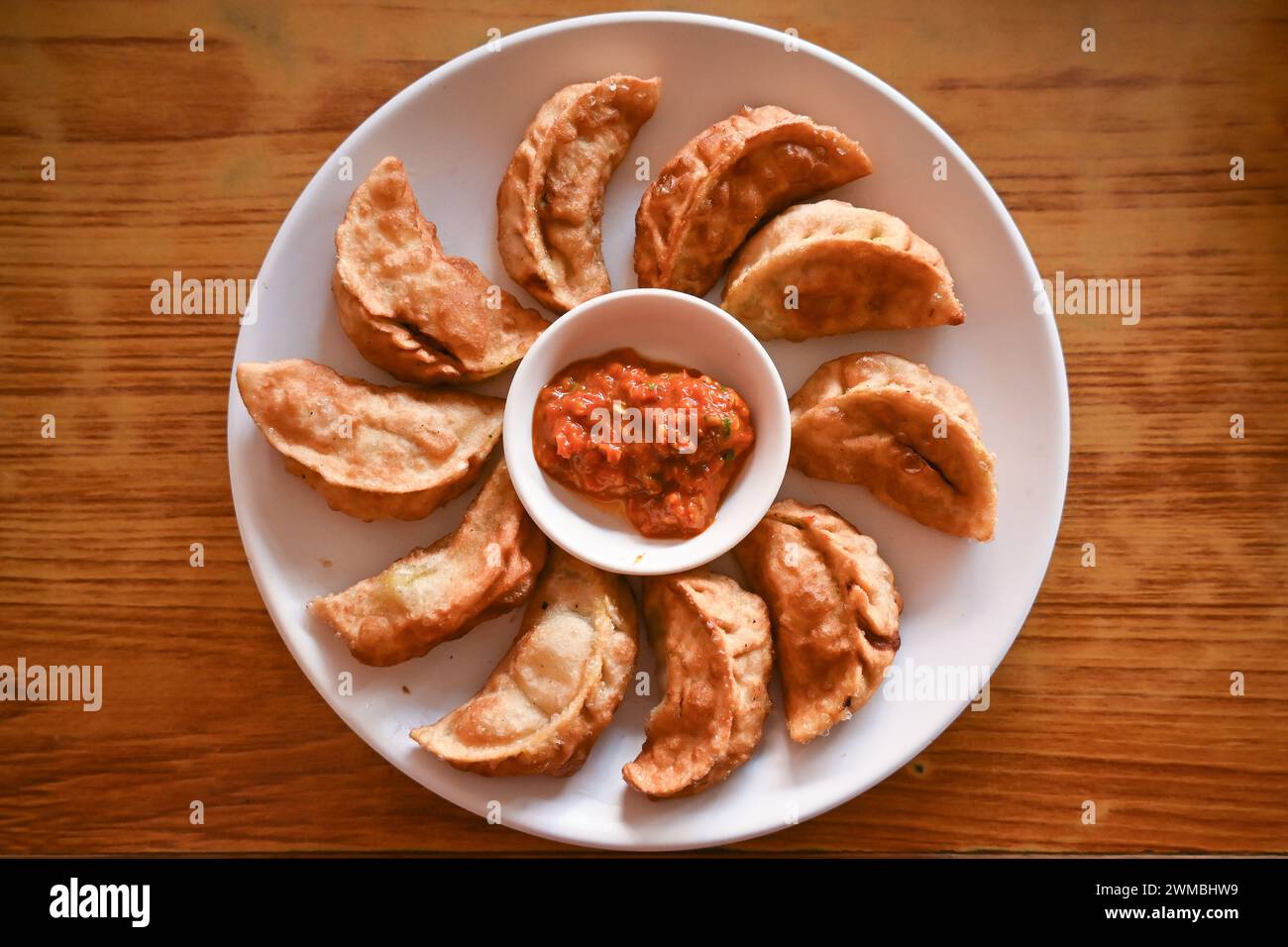 Top view of ten fried chicken momos, typical filled dumplings Stock ...