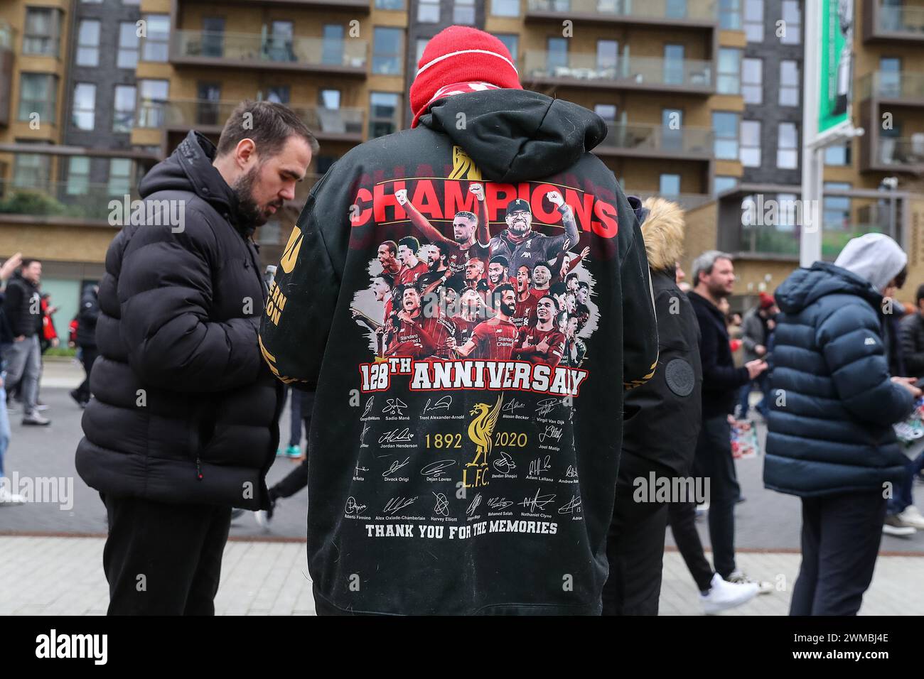 A Liverpool fan wearing a Champions 128th anniversary jacket during the ...