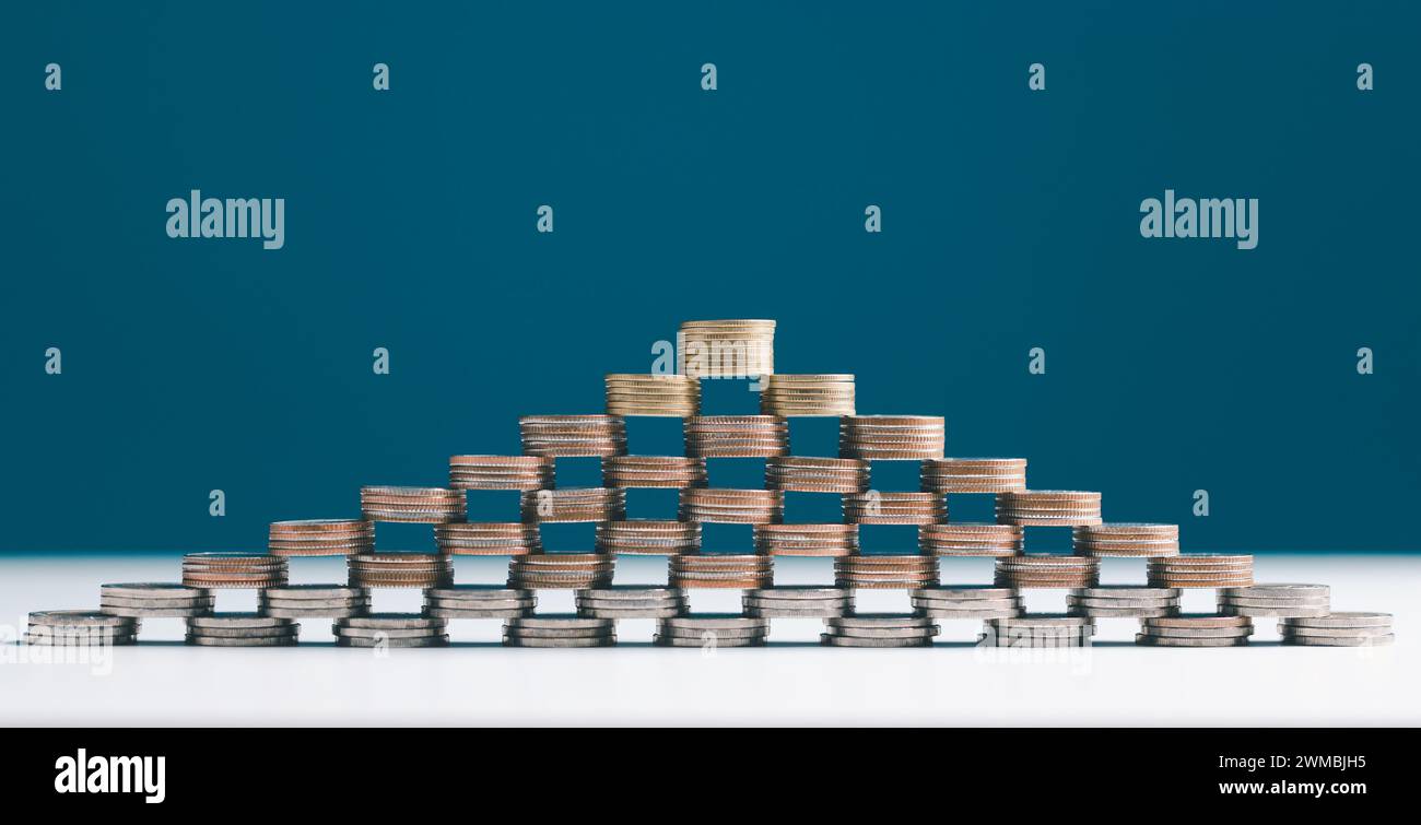 Coin stacks on a blue background. Coins stack for a financial business ...