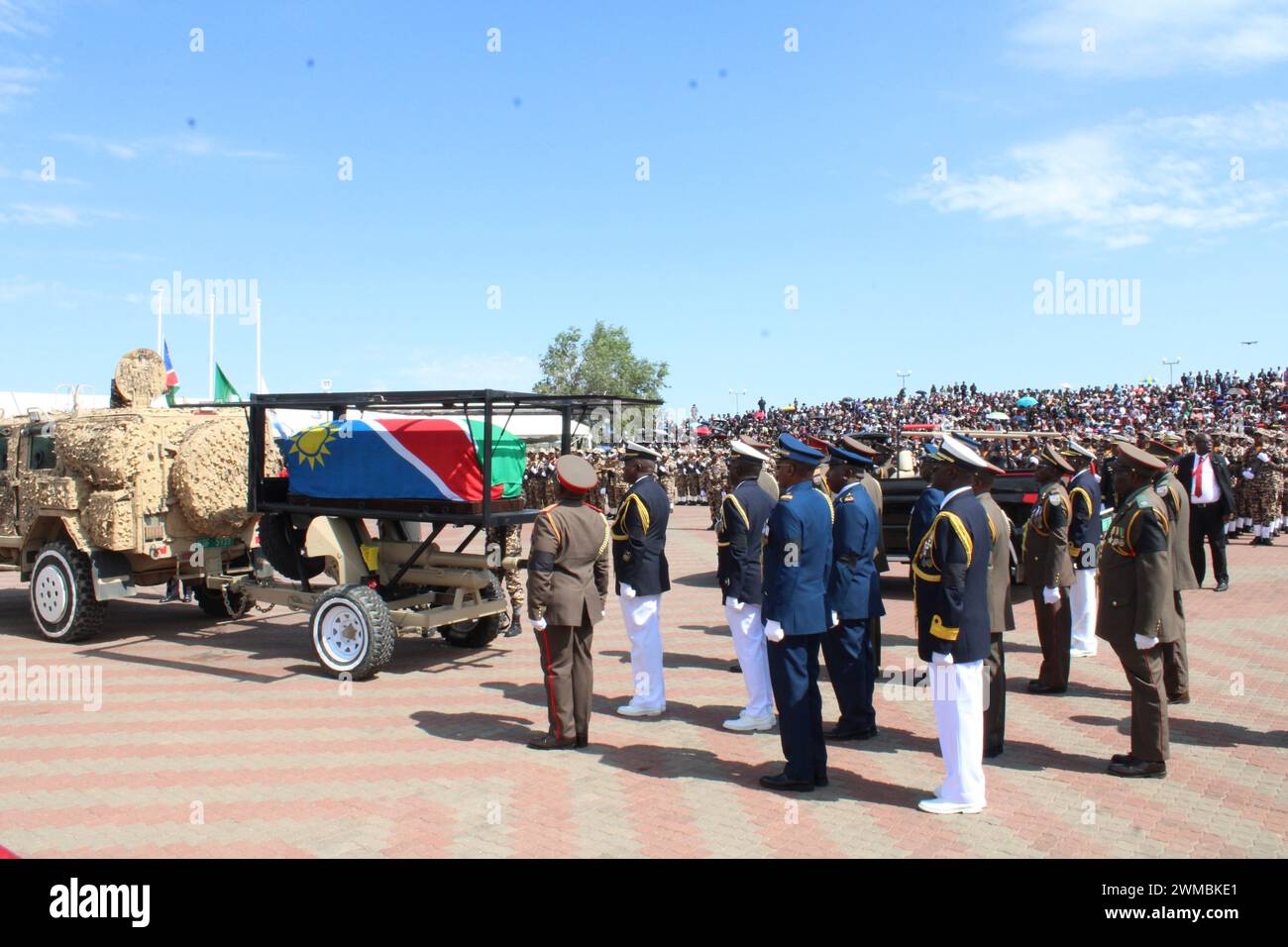 Mourners follow the flag-draped coffin of the late Namibian President ...