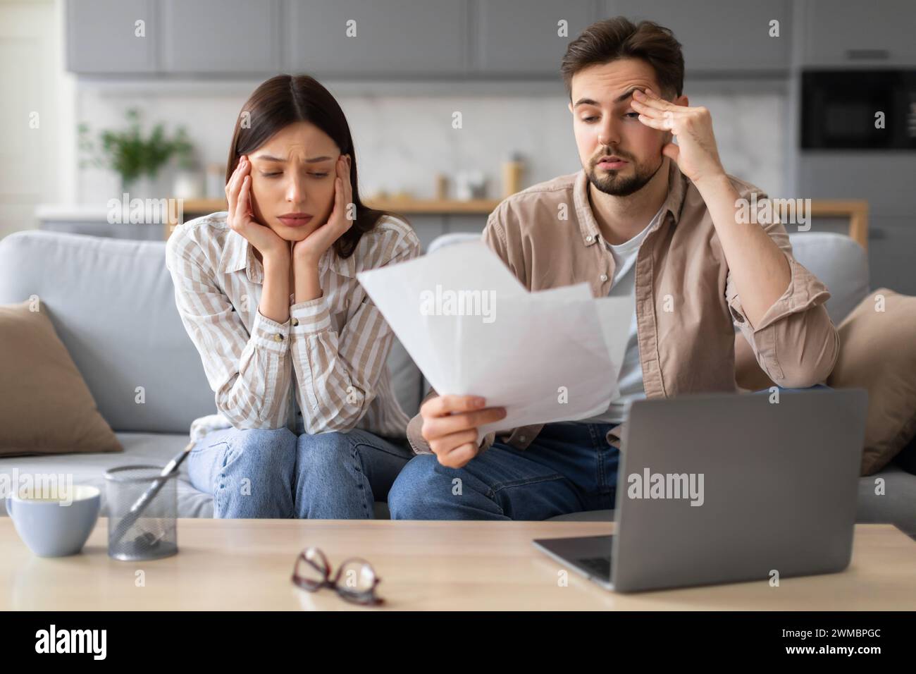 Worried couple managing domestic hi-res stock photography and images ...