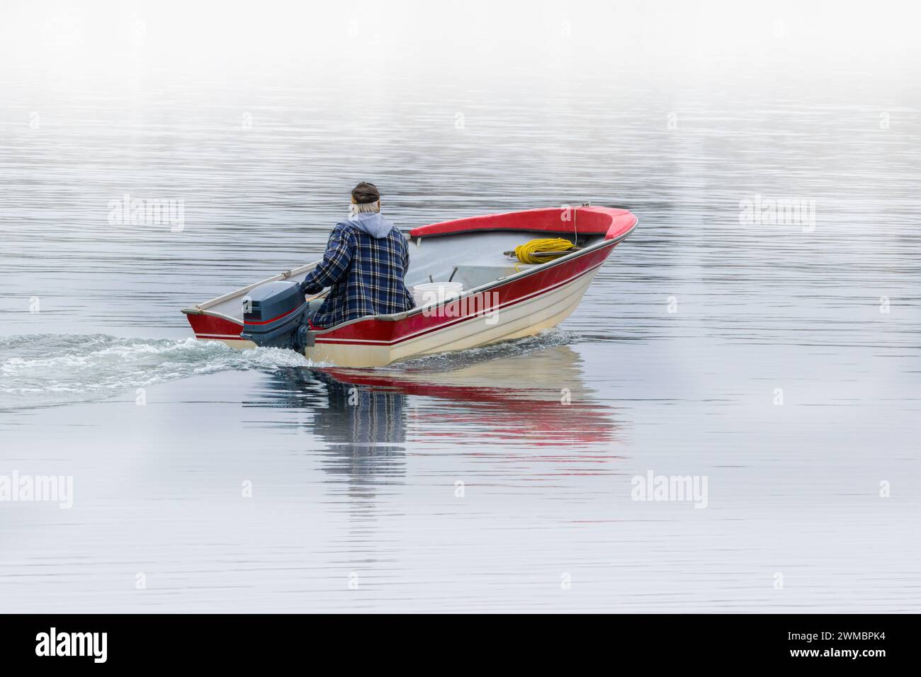 Row boat fisherman in lake hi-res stock photography and images - Alamy